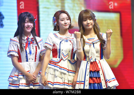 Members of Chinese idol girl group AKB48 Team SH, an official sister ...