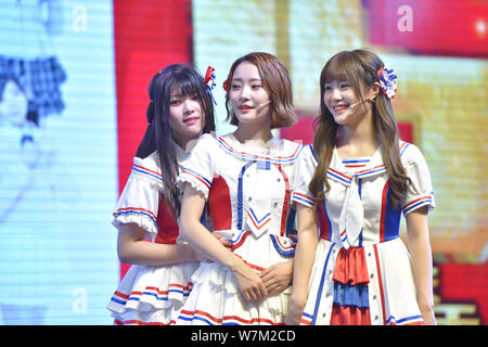 Members of Chinese idol girl group AKB48 Team SH, an official sister ...