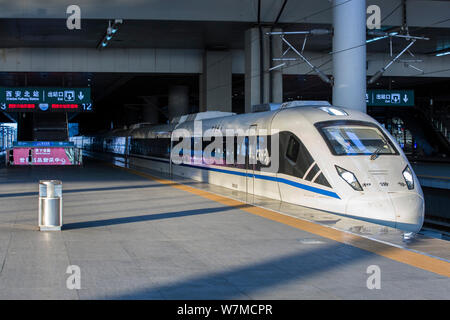 CRH5G (China Railway High-speed) bullet trains are pictured at the ...