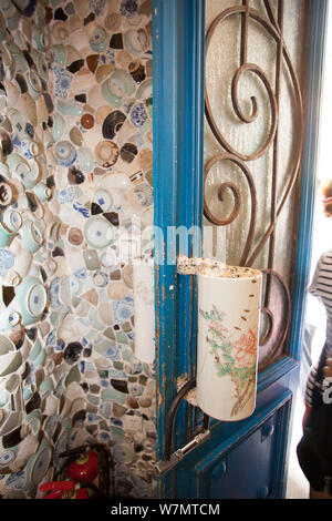 Porcelain House (also known as China House), with chinaware cemented ...