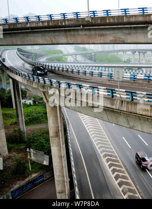View of the five-story structure Huangjuewan Flyover in Chongqing ...