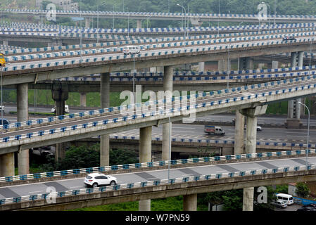 Aerial view of the five-story structure Huangjuewan Flyover in ...