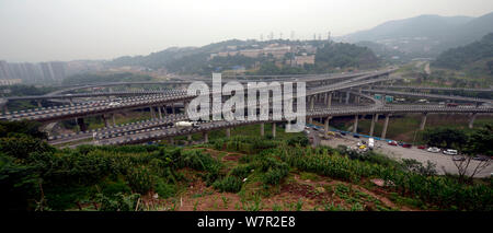 Aerial view of the five-story structure Huangjuewan Flyover in ...