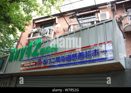 View of a signboard of China's 1st O2O Charity Supermarket, Buy42 ...