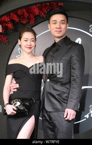 Taiwanese TV hosts Dee Hsu, left, and her husband Mike Hsu attend the ...