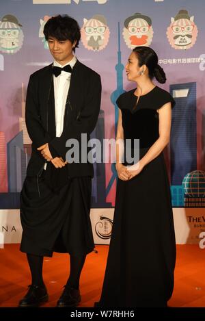 Japanese actress Rena Tanaka, right, and actor Takumi Saito attend the ...