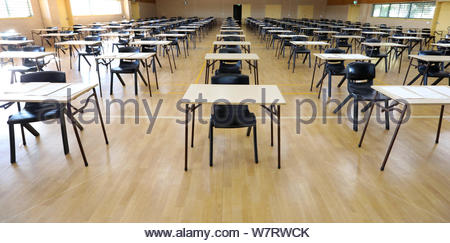Exam tables and chairs set up in a UK school Stock Photo - Alamy