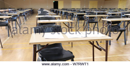 Exam tables and chairs set up in a UK school Stock Photo - Alamy
