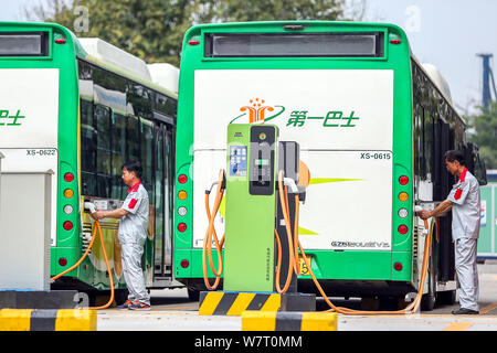 GUANGZHOU, GUANGDONG PROVINCE, CHINA - Bus stop in city of Guangzhou ...