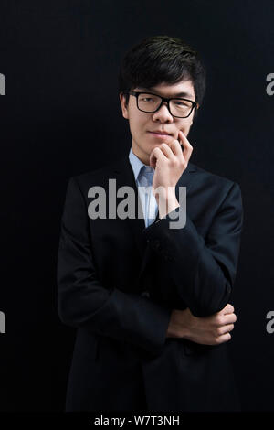 --FILE--Chinese Go player Ke Jie poses during an interview in Beijing ...
