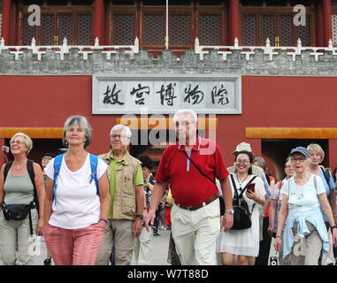 Foreign tourists visit the Palace Museum in Beijing, China, 21 June ...