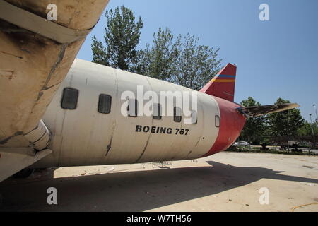 An old plane with "Boeing 767" and "QANTAS" on its fuselage is pictured ...