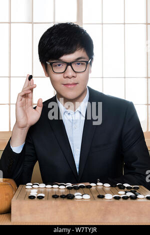 --FILE--Chinese Go player Ke Jie poses during an interview in Beijing ...