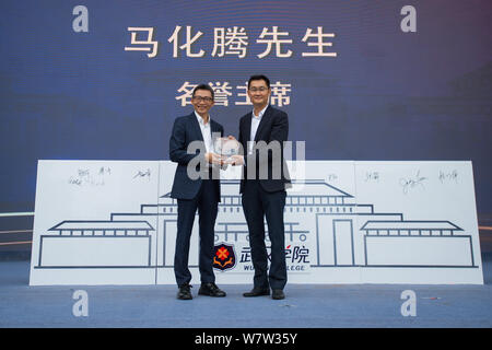Chen Yidan, left, co-founder of Tencent Holdings Ltd., and Pony Ma ...
