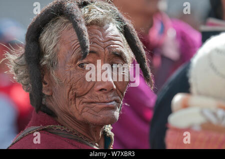 Man in traditional Mompa tribe dress (typical head dress made from Yak ...