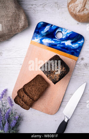 Odessa, UKRAINE - August. 10, 2019: Cutting board with marine abstract ...