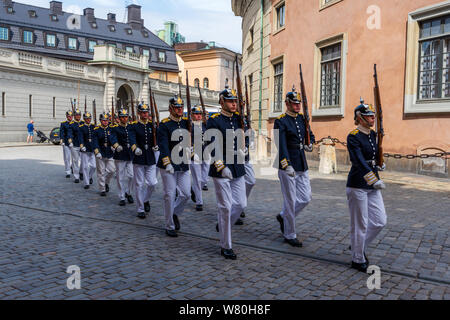 formation of soldiers in blue uniforms marching in a parade 16 Stock ...