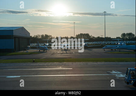 London Luton Airport, UK, check-in hall. Easyjet passengers queue to ...