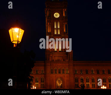 Historic town hall in red autumn leaves on the market square ...