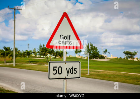 Warning sign - Golf carts Stock Photo - Alamy