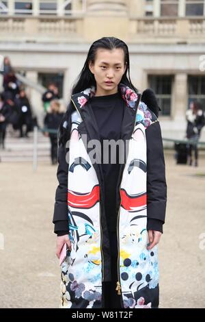 Chinese model Wang Xinyu attends the Moncler Gamme Rouge Fashion Show ...