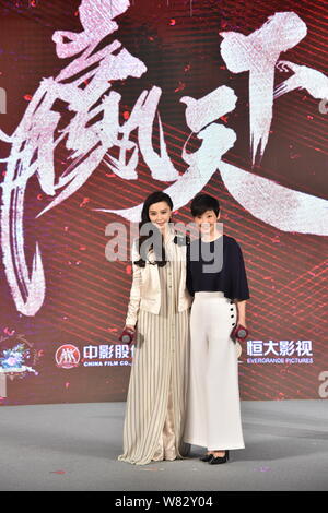 Chinese actresses Fan Bingbing, left, kisses Angela Pan Yin-tze at a ...