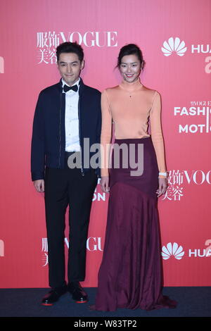 Chinese actor Hu Ge, right, and actress and singer Regina Wan Qian pose ...