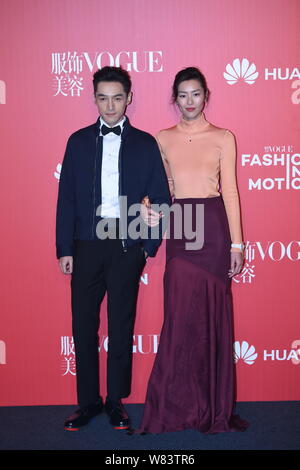 Chinese actor Hu Ge, right, and actress and singer Regina Wan Qian pose ...