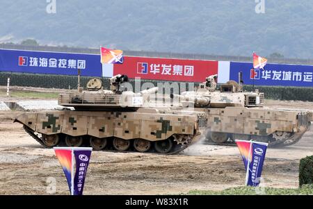 A Chinese-made VT2 tank, front left, an export version of the Type 96G ...