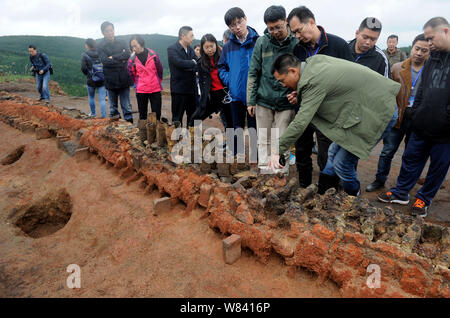 Chinese archaeologists investigate zinc smelting furnace and slag at an ...