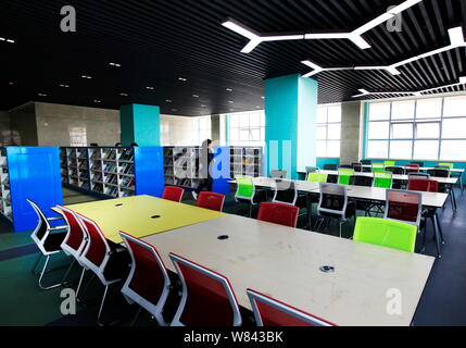 An interior view of the new library at Sias International University ...