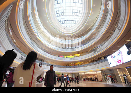People are shopping at Vanke Mall in Qibao town, Shanghai, China, 2 ...