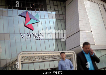 People are shopping at Vanke Mall in Qibao town, Shanghai, China, 2 ...
