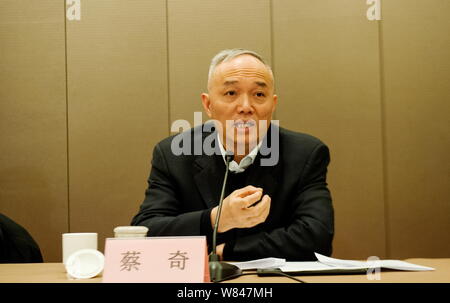 --FILE--Cai Qi, then mayor of Hangzhou city, attends a panel discussion ...