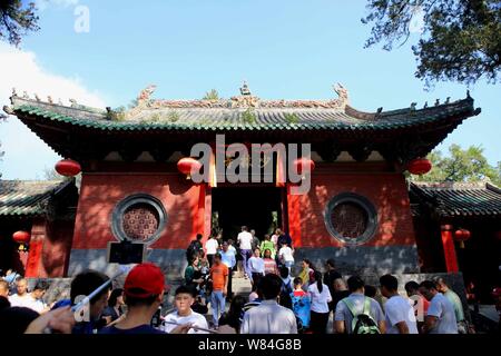 Tourists crowd the Shaolin Temple on the Songshan Mountain (Mount ...