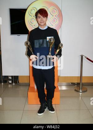 Hong Kong-based Chinese singer Hins Cheung King-hin poses with his ...