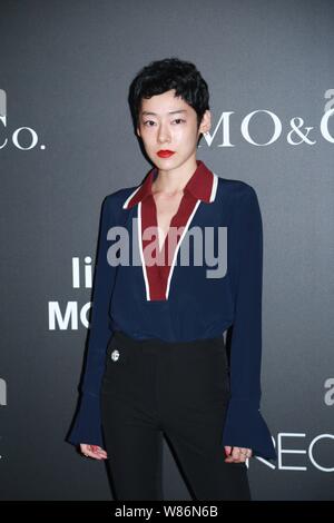 Japanese super model Sayo Akasaka poses at a fashion show of "MO&Co in ...