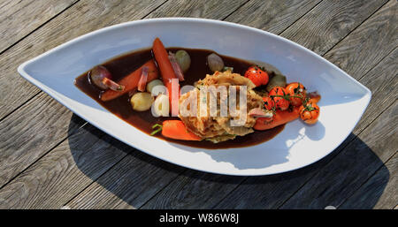 Guernsey Ormers - shellfish from the abalone family - being prepared to ...