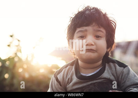 Close up of illness asian child admitted in hospital with saline ...
