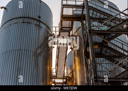 Massive storage containers at a brewery manufacturing plant Stock Photo ...