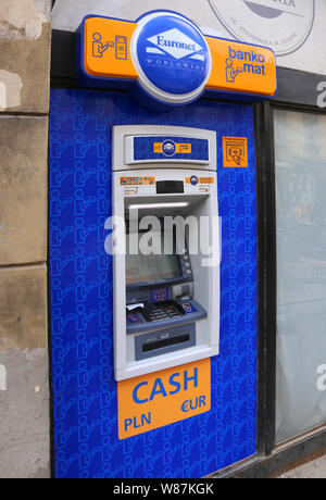 An ATM machine of Euronet bank outside at street. Euronet Worldwide is ...