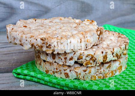 Stack of crispbreads on dark wooden table Stock Photo - Alamy