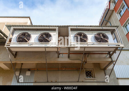 Air conditioner compressor unit hanging on the wall, outdoor Stock ...