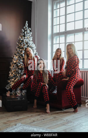 Group of friends in Christmas pajamas Stock Photo - Alamy