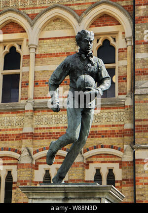 A bronze statue of William Webb Ellis outside Rugby School in Rugby ...
