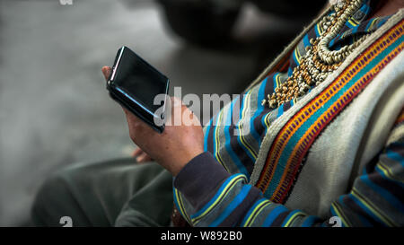Aboriginal man dressed in traditional costume near Uluru Ayers Rock ...