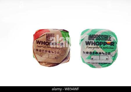 Burger King Whopper in wrapper on white background. Cut out Stock Photo ...