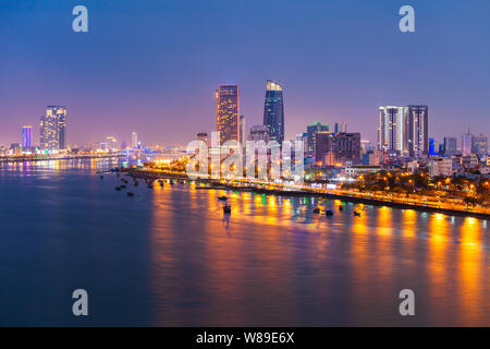 Aerial sunset view of Da Nang coastline. My Khe beach seafront with ...