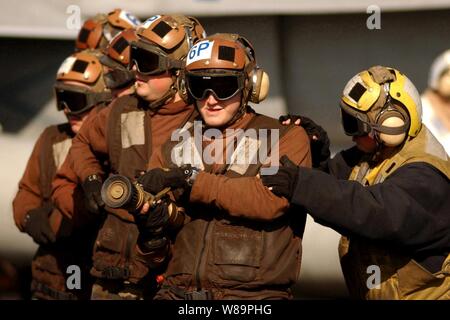FIRE HOSE, flight deck, flight deck fire drill, hose team, Pacific ...
