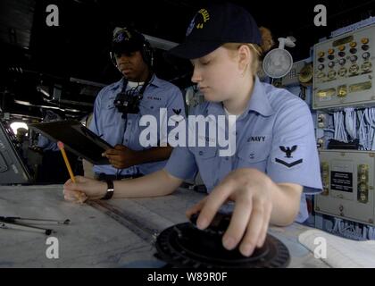 Petty Officer 3rd Class Benjamin Rawson (left), a Fleet Marine Force ...